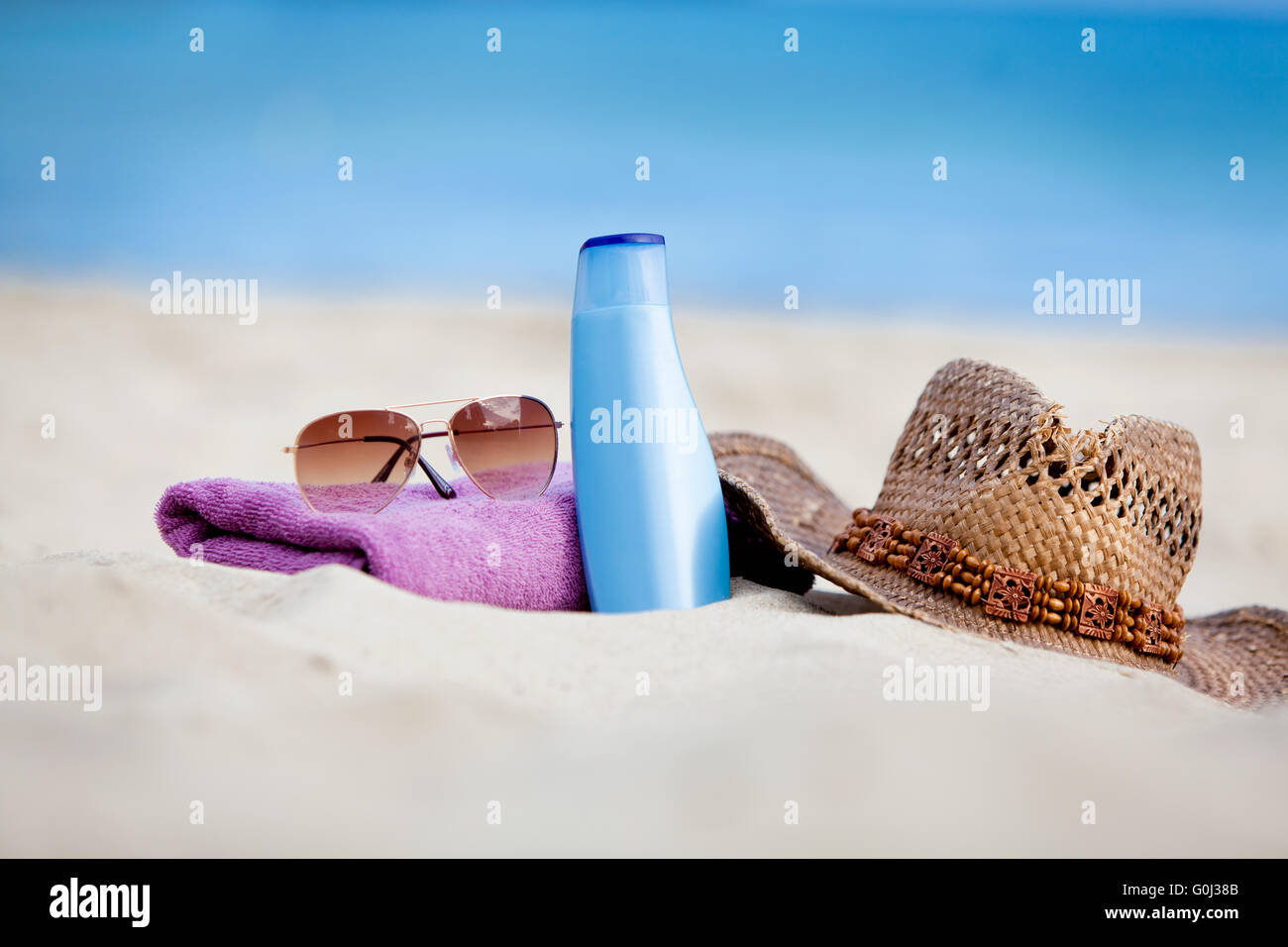 sunprotection objects on the beach in holiday Stock Photo - Alamy
