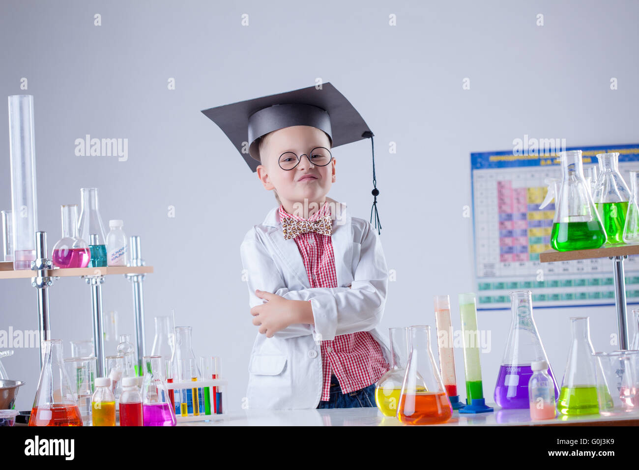 Funny boy posing as chemist in chemical laboratory Stock Photo - Alamy