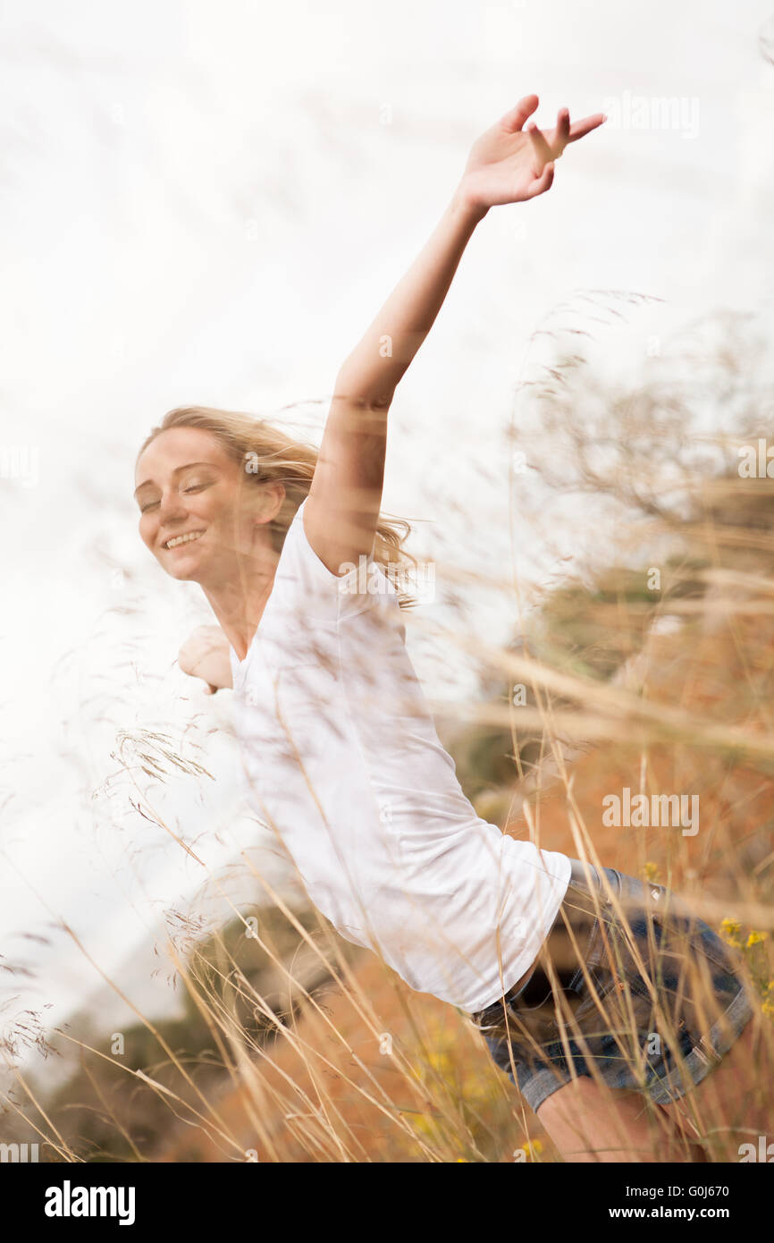 young happy attractive woman arms wide open Stock Photo - Alamy