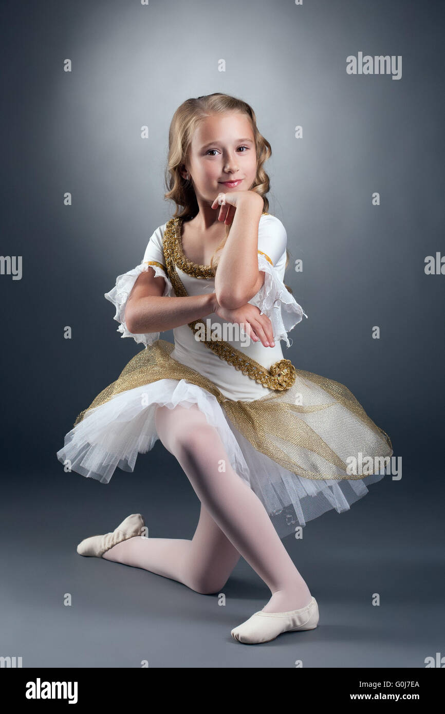 Amazing little ballet dancer posing at camera Stock Photo - Alamy