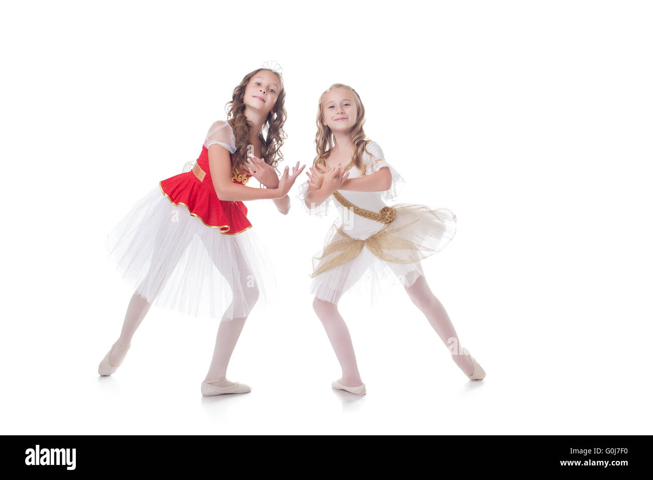 Two adorable ballet dancers, isolated on white Stock Photo - Alamy
