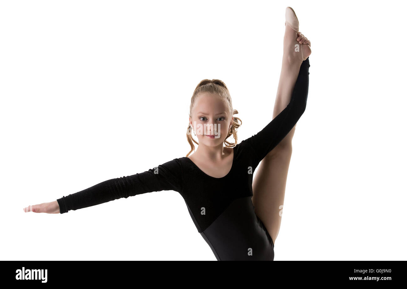 Nice little gymnast posing doing vertical split Stock Photo - Alamy