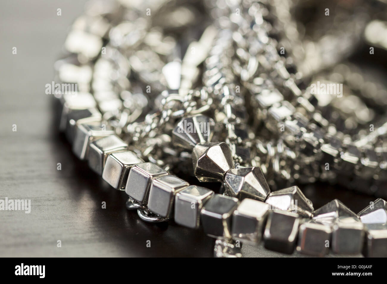 Silver jewellery pile hi-res stock photography and images - Alamy