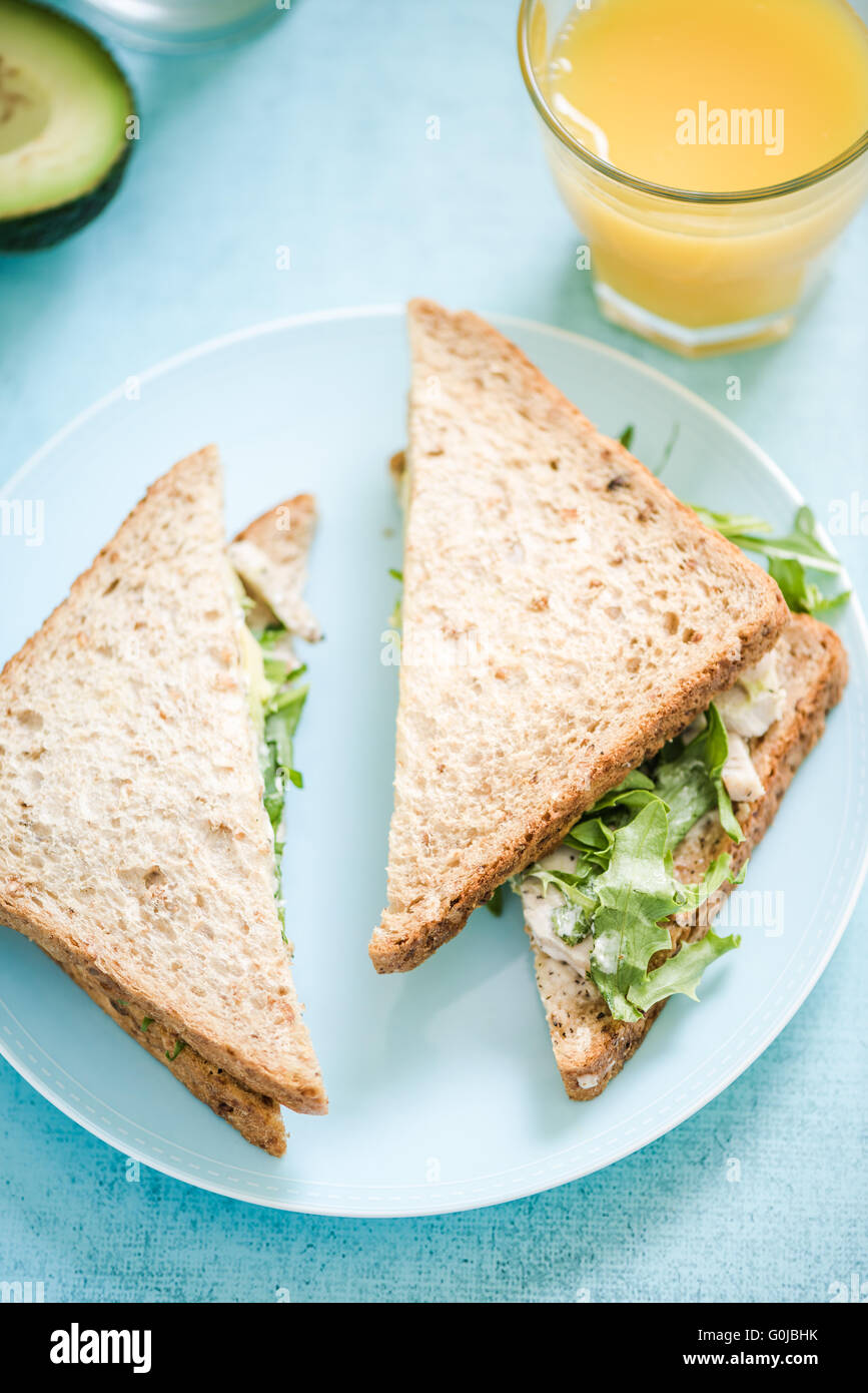 Chicken and avocado wholegrain bread sandwich triangles Stock Photo - Alamy