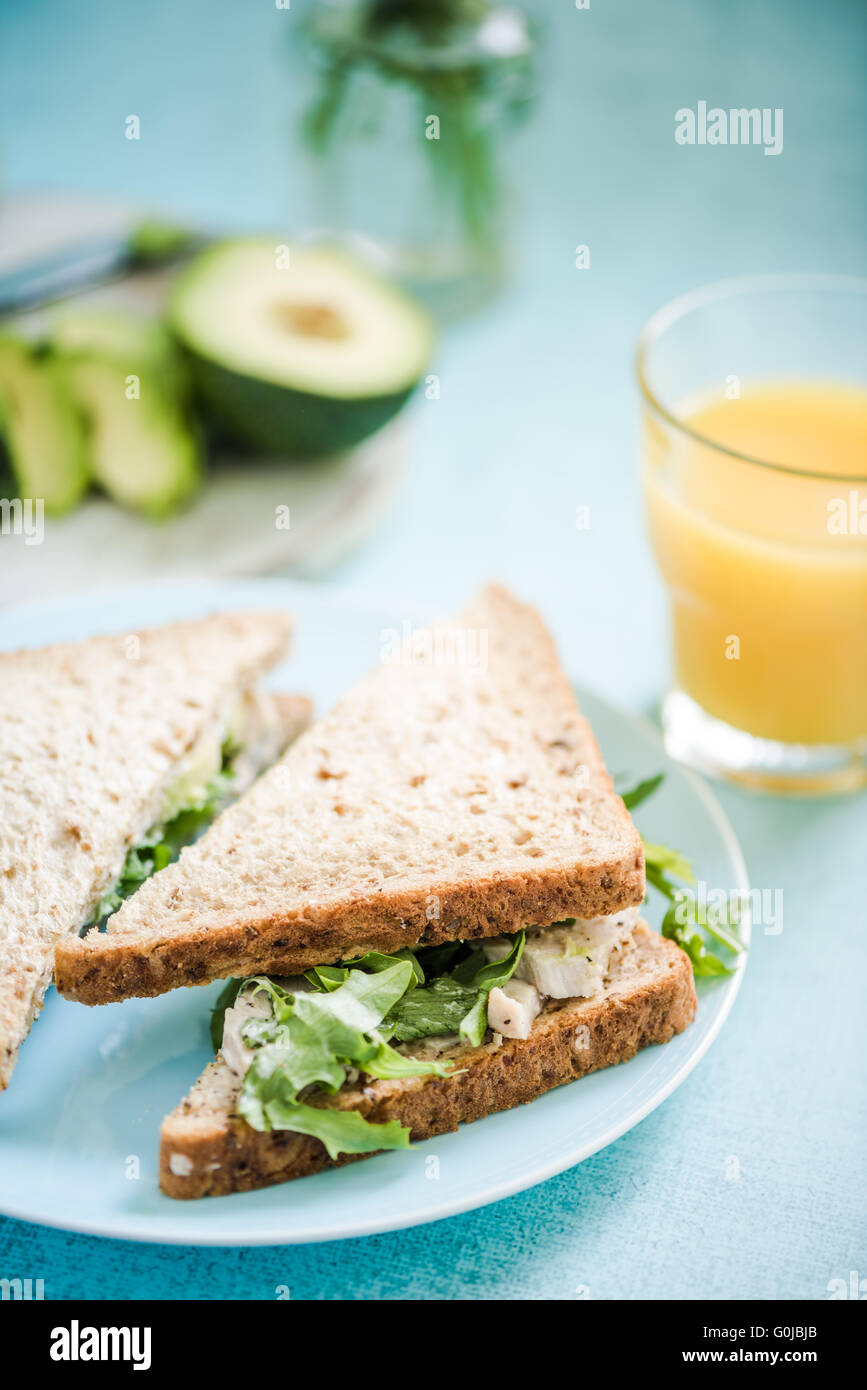 Chicken and avocado wholegrain bread sandwich triangles Stock Photo - Alamy