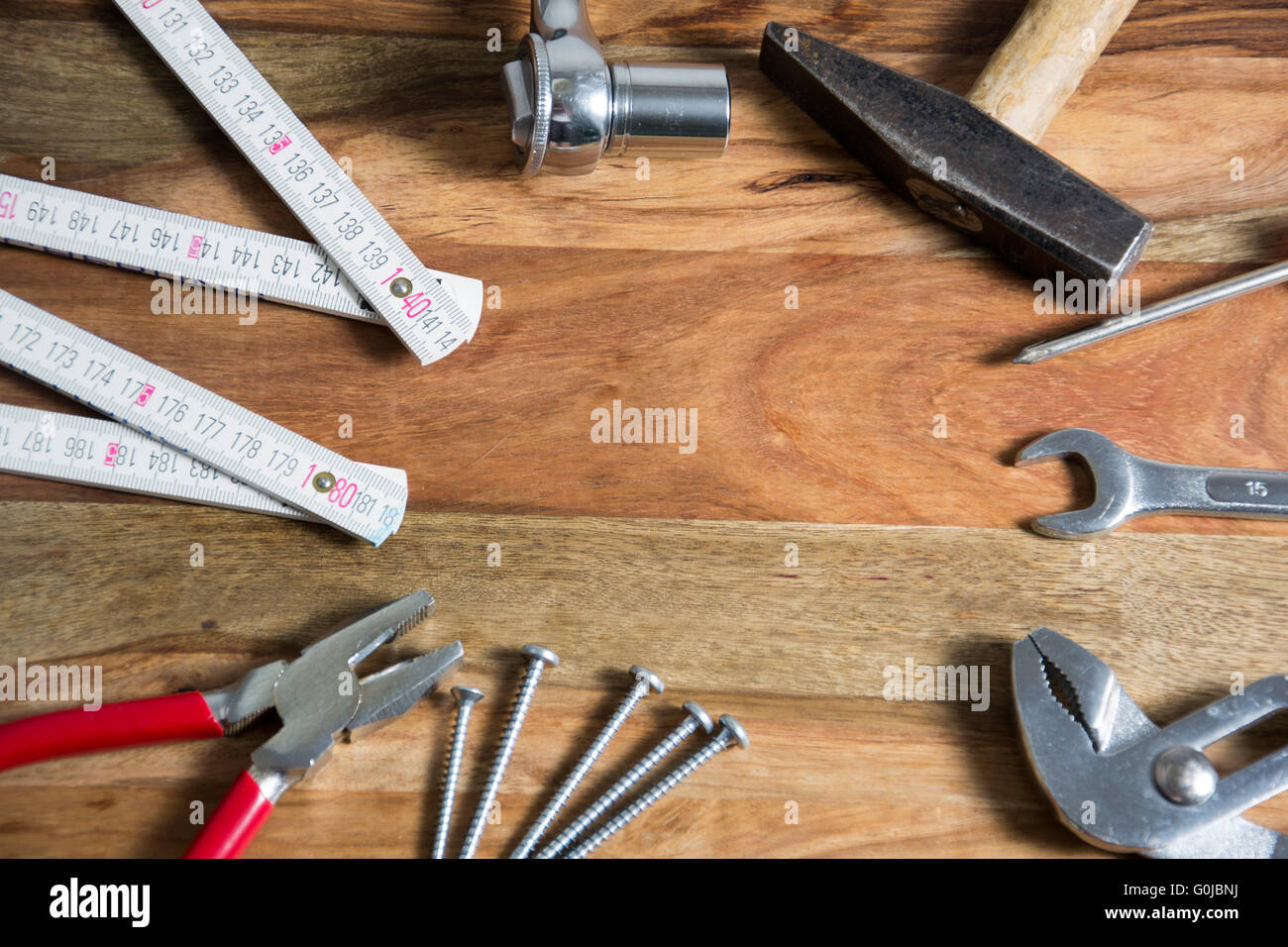 tool on wooden background Stock Photo - Alamy