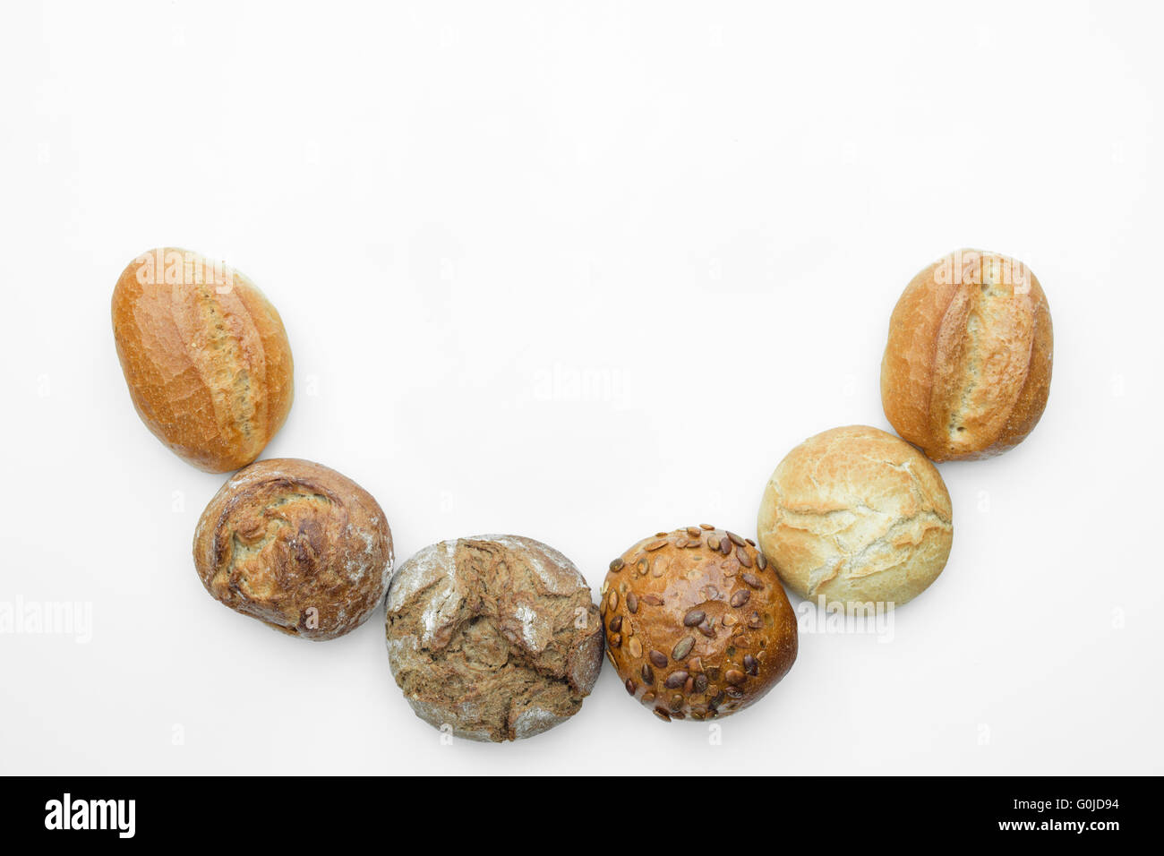 Group of German traditional breads aligned on curve on white isolated ...