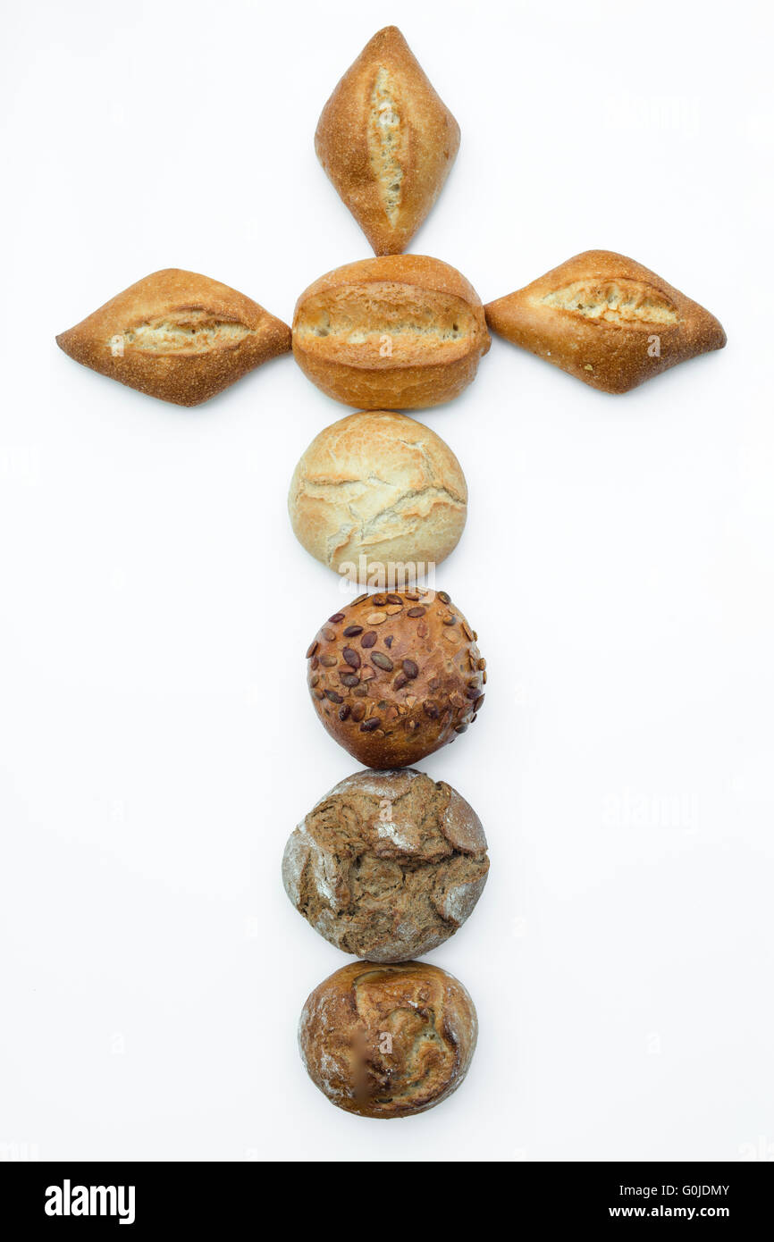 Group of German traditional breads forming a cross on white isolated ...