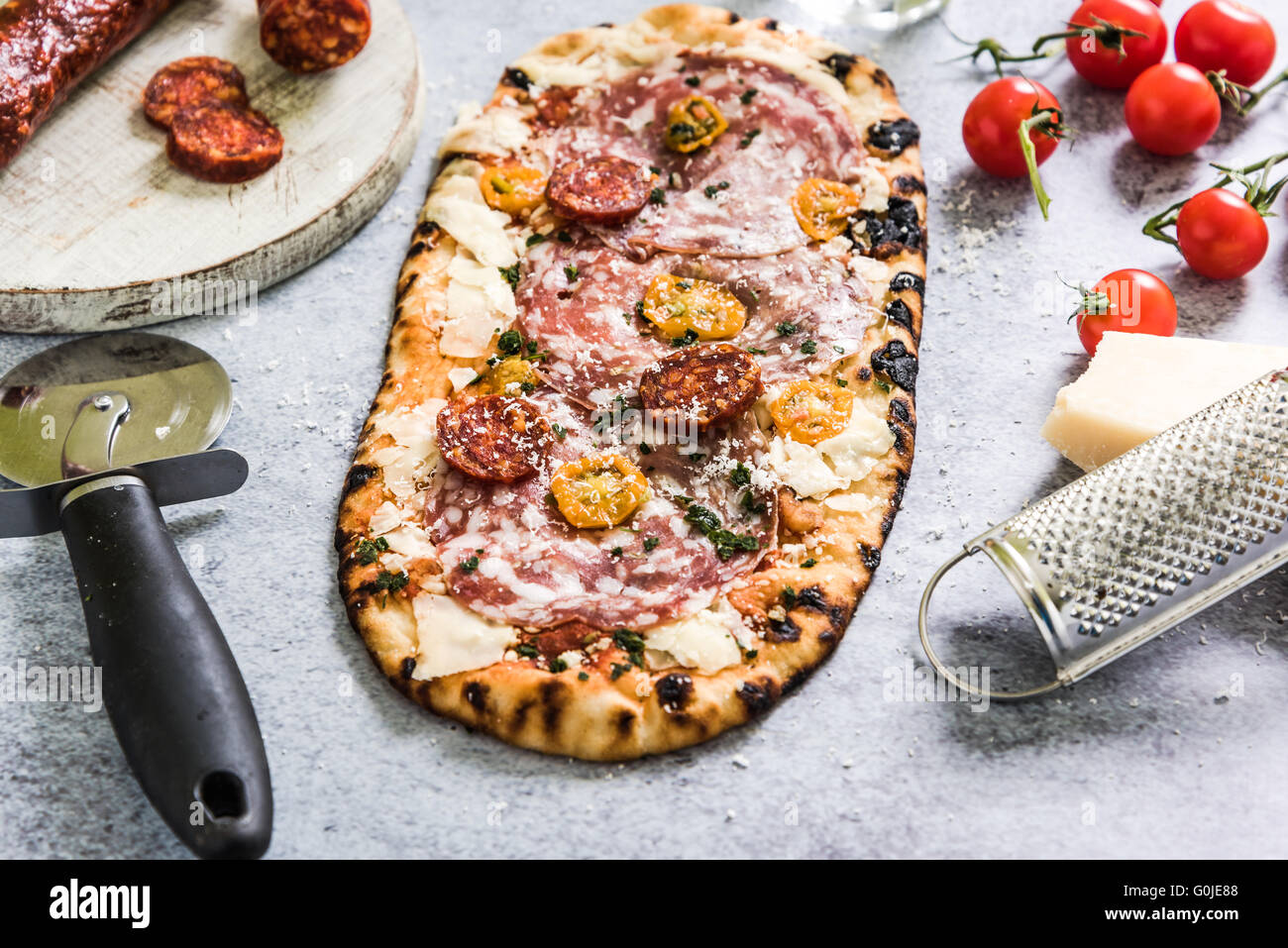 freshly prepared pizza with fresh ingredients Stock Photo - Alamy