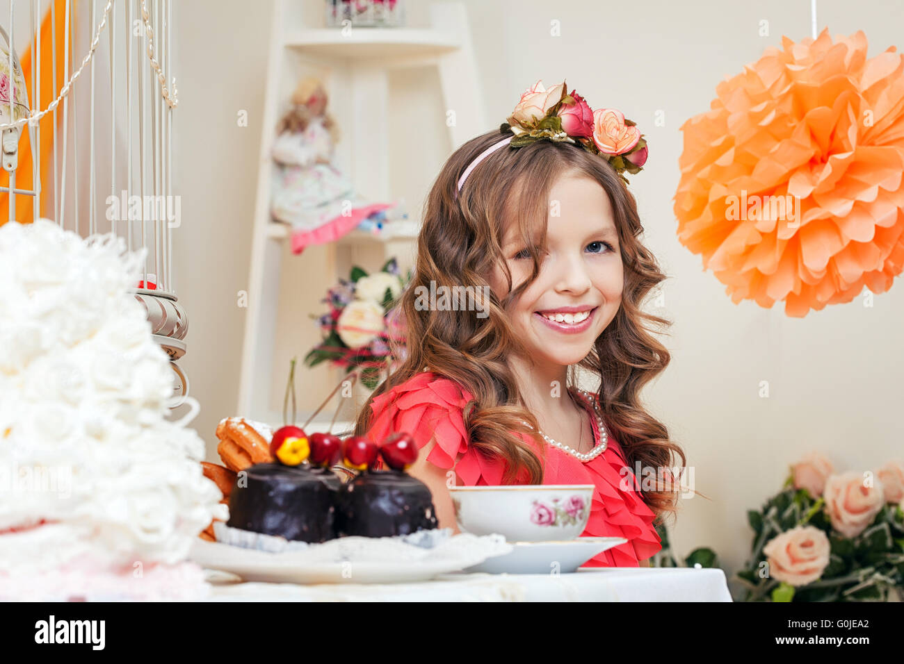 Image of smiling elegant young girl drinking tea Stock Photo - Alamy