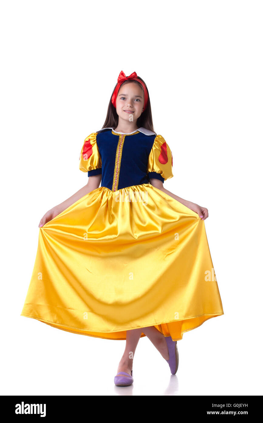 Charming girl dressed as Snow White doing curtsy Stock Photo - Alamy