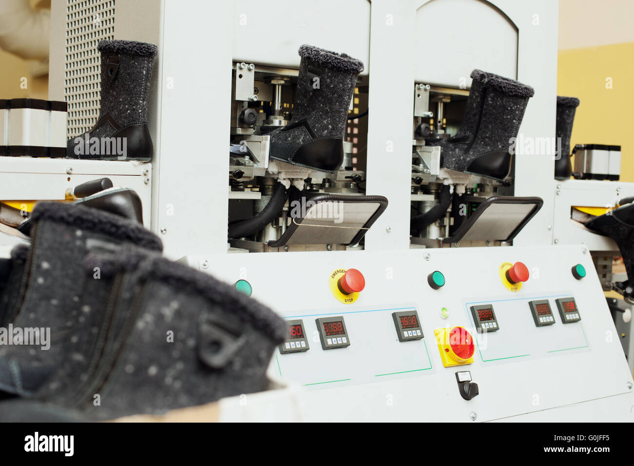 Machine for production and processing of shoes Stock Photo - Alamy