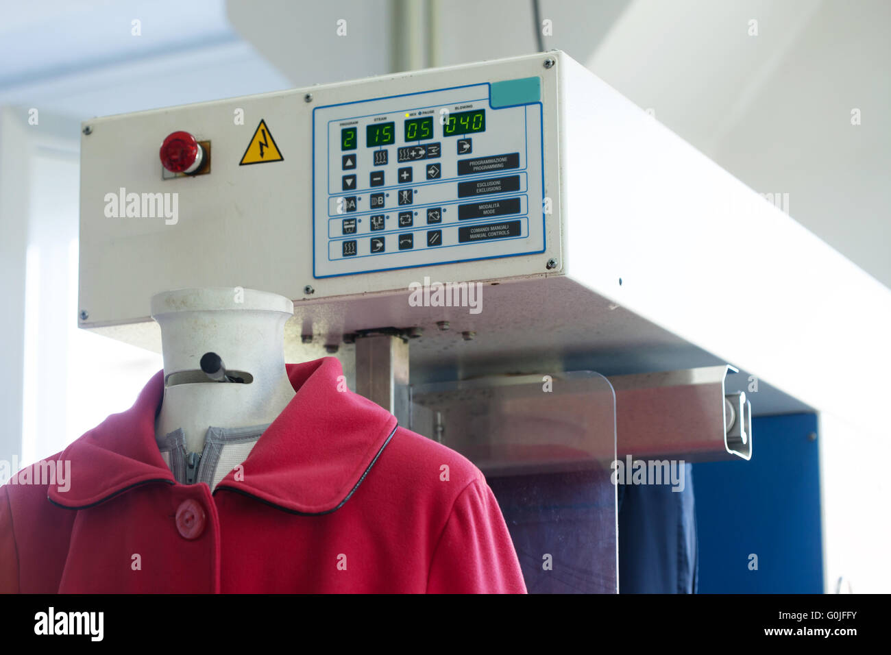 Laundry steam press machine hi-res stock photography and images - Alamy
