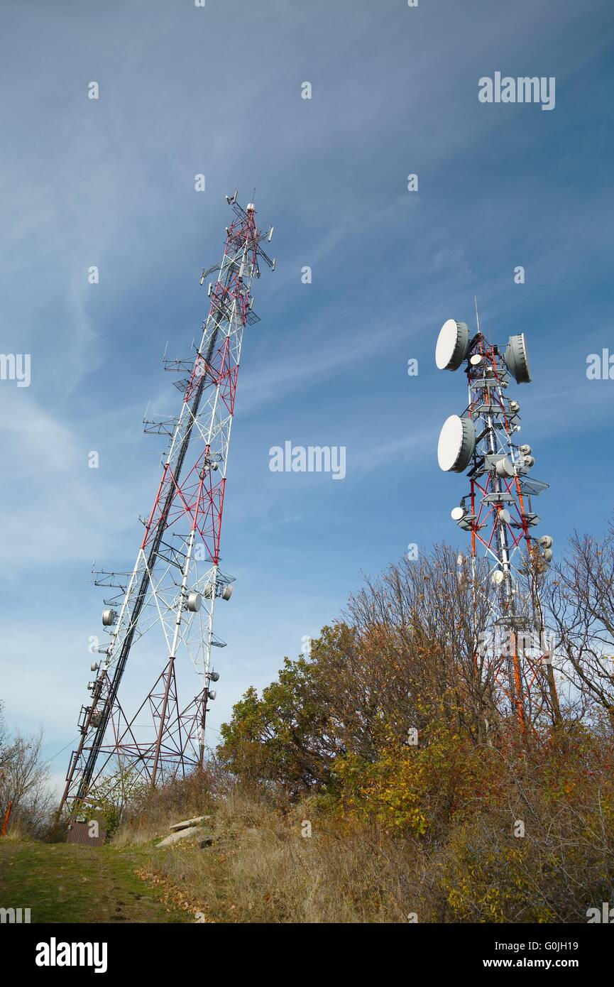 Transmitter towers on a hill Stock Photo - Alamy