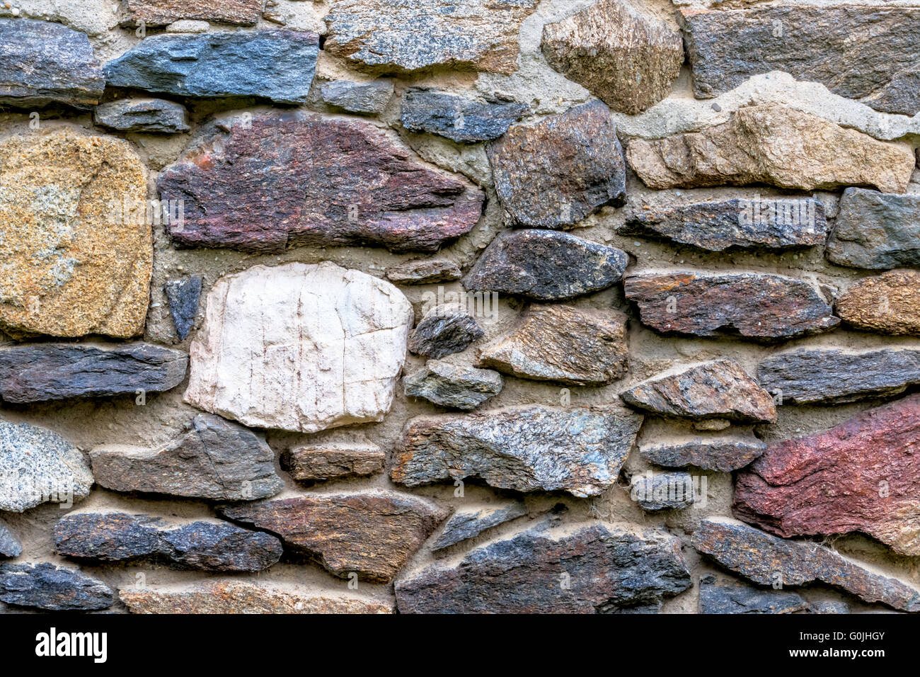 masonry multi-colored natural stones Stock Photo - Alamy