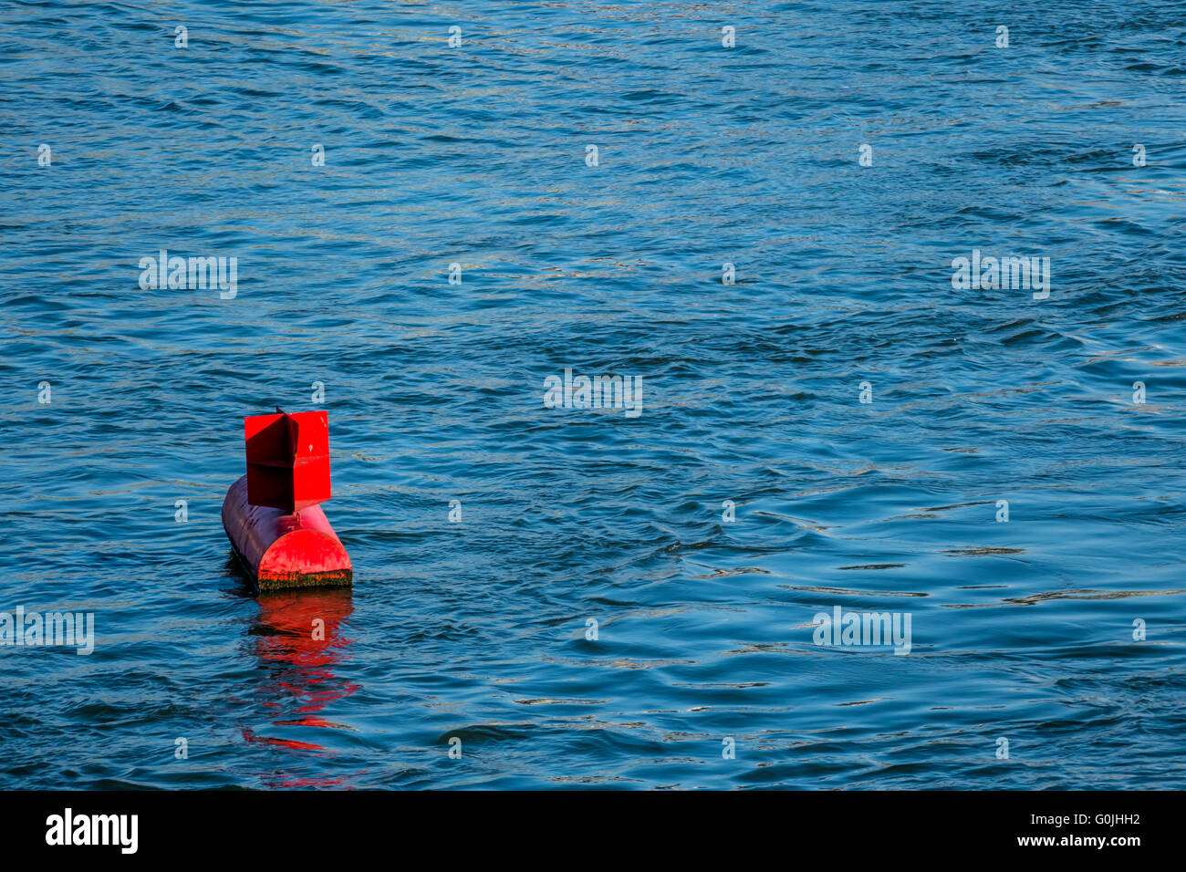 red buoy water surface Stock Photo - Alamy