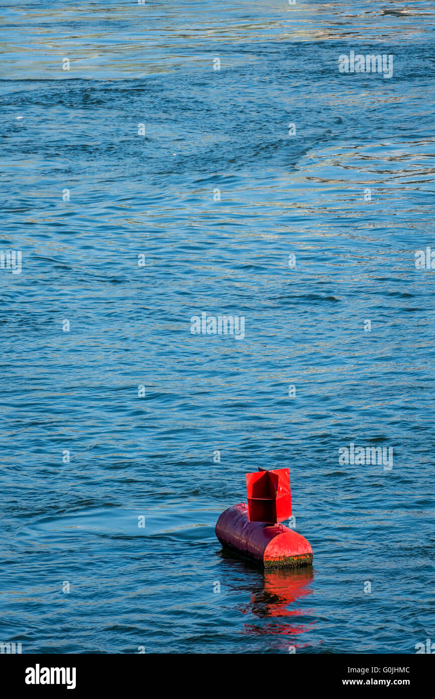 red buoy water surface Stock Photo - Alamy
