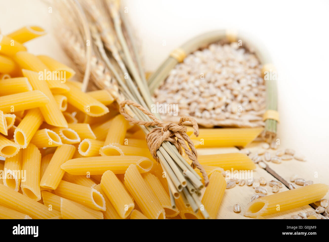 short Italian pasta penne with durum wheat grains Stock Photo - Alamy