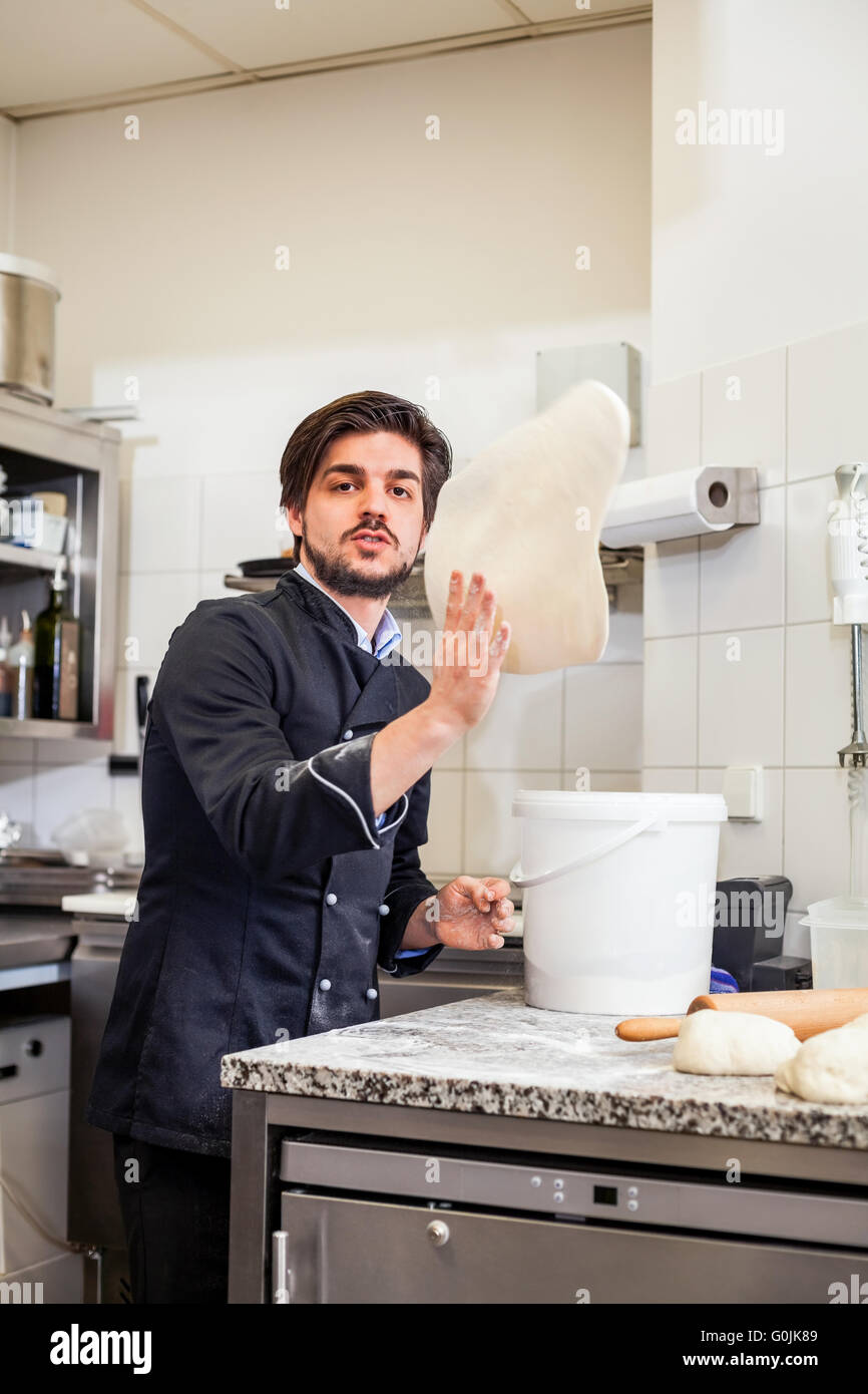 Pizza chef tossing hi-res stock photography and images - Alamy