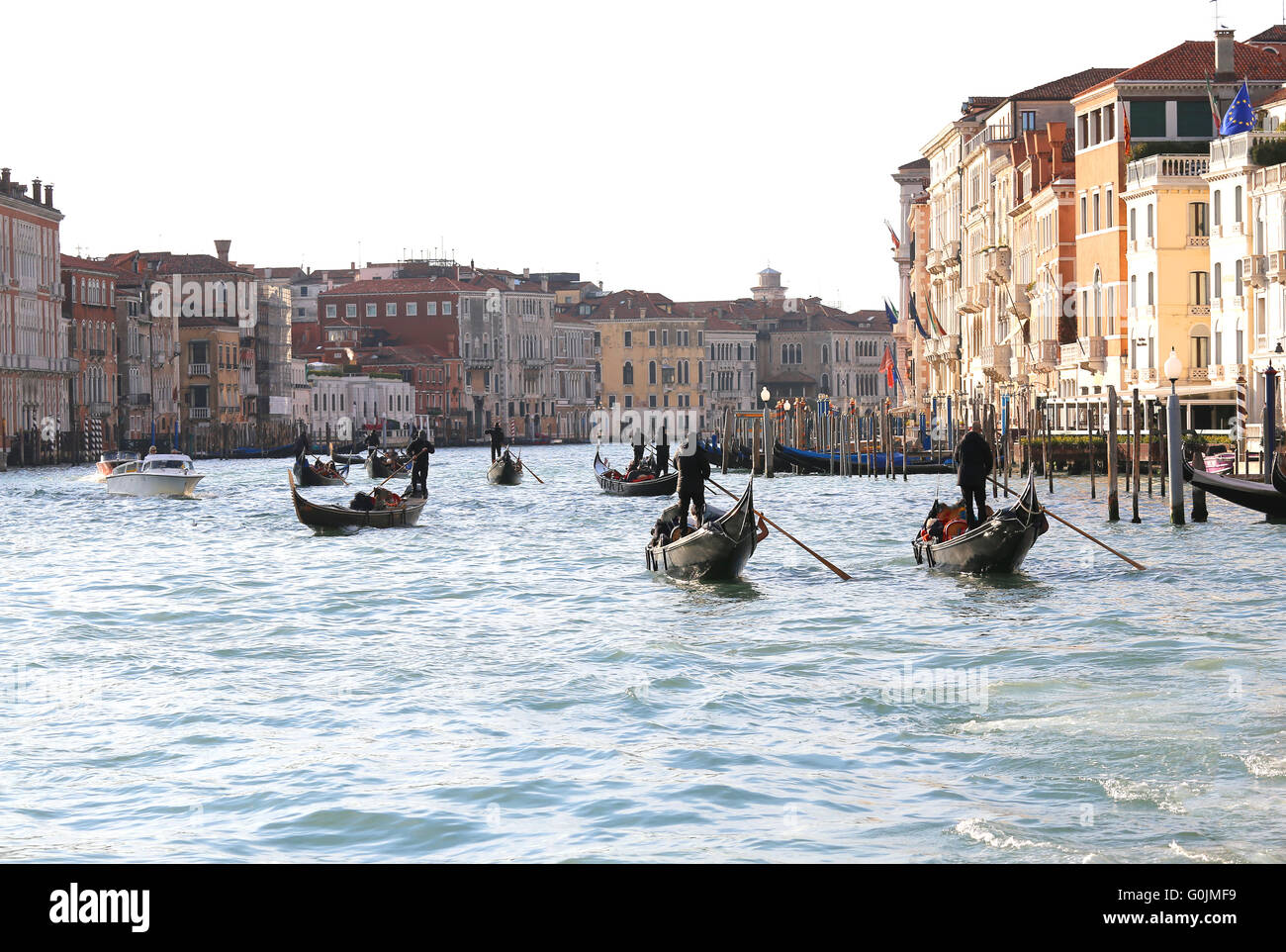 Venice, Italy. Boats and gondolas with many tourists sailing on the ...