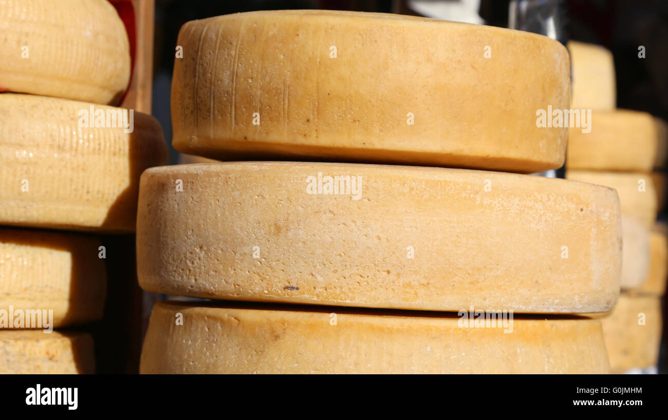 matured cheeses on sale in the food market Stock Photo - Alamy