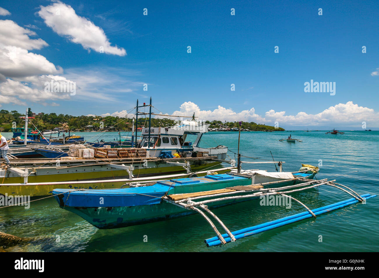 Philippines Bohol Fishing boats moored next to one of the bridges to ...