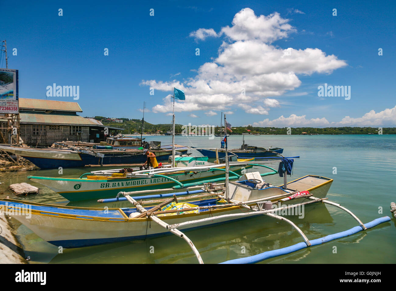 Philippines Bohol Fishing boats moored next to one of the bridges to ...