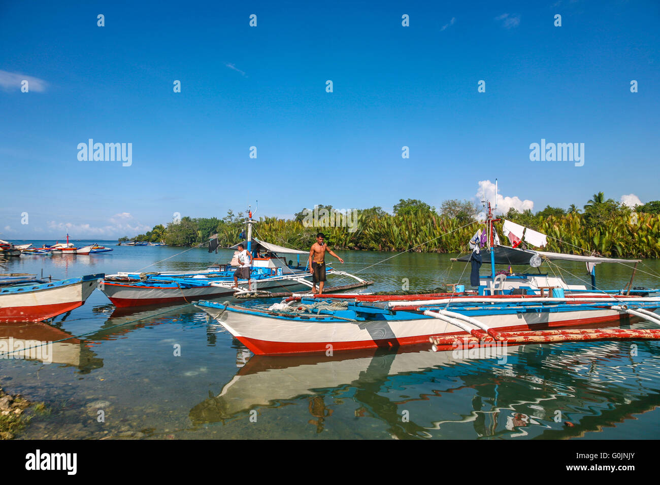 Philippines Bohol Fishing boats on the river at Loay Adrian Baker Stock ...
