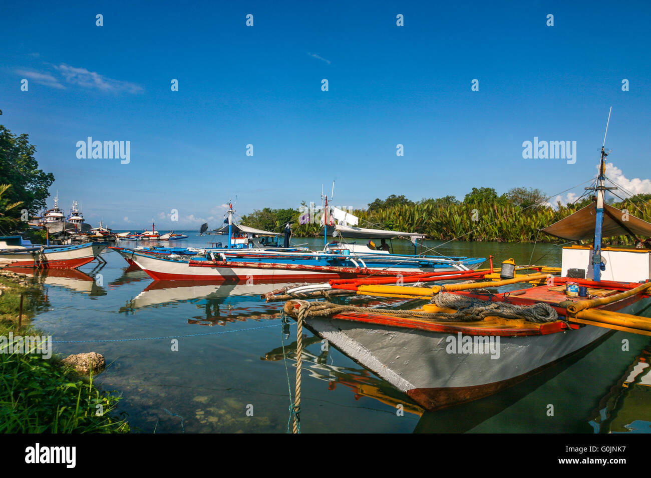 Philippines Bohol Fishing boats on the river at Loay Adrian Baker Stock ...