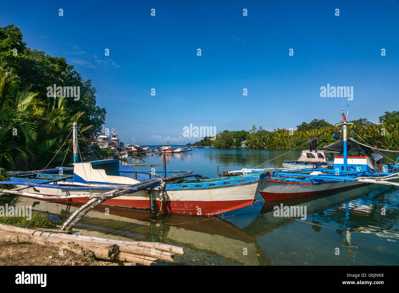 Philippines Bohol Fishing boats on the river at Loay Adrian Baker Stock ...