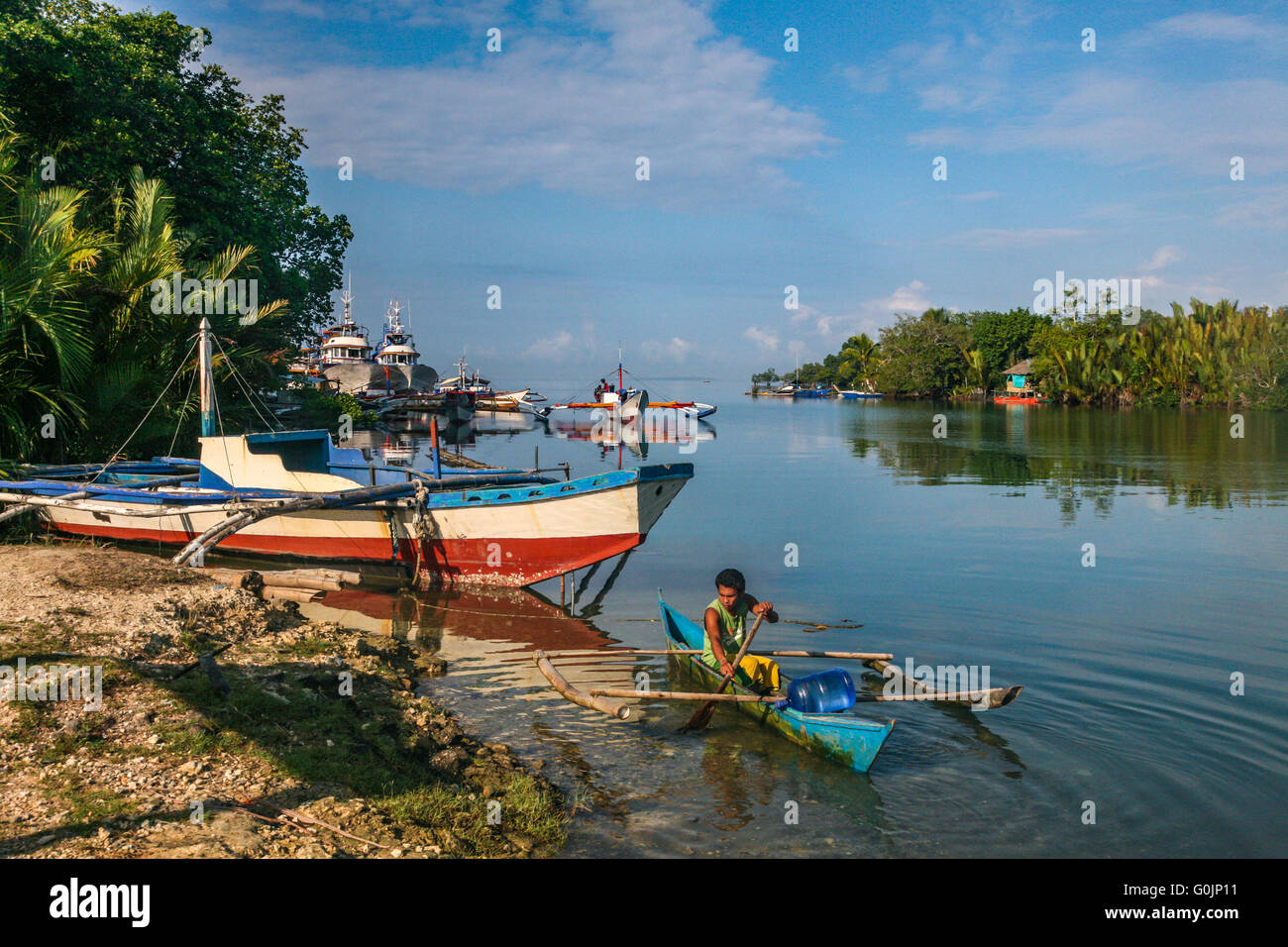 Philippines Bohol Fishing boats on the river at Loay Adrian Baker Stock ...
