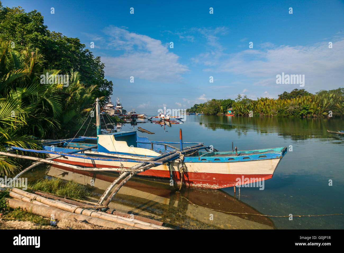 Philippines Bohol Fishing boats on the river at Loay Adrian Baker Stock ...