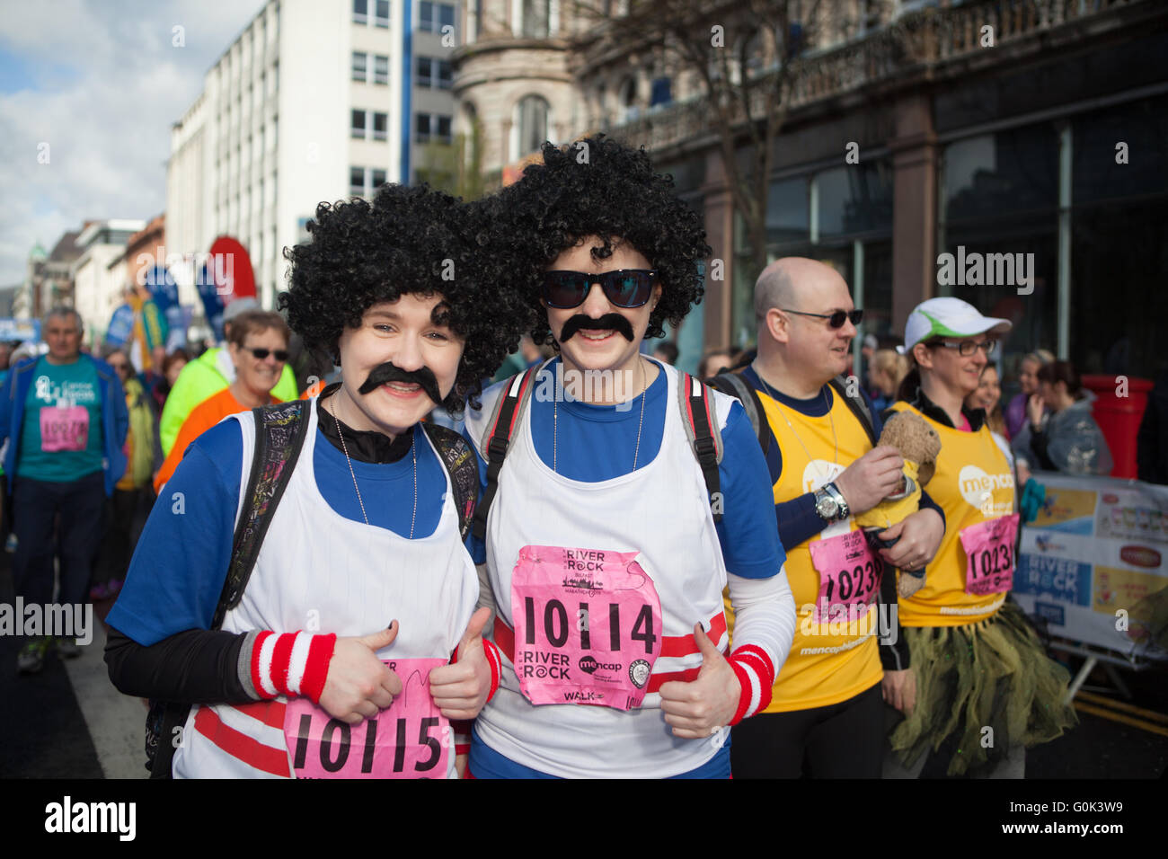 Belfast, UK. 2nd May 2016. A couple dressed as scoucers with curley ...