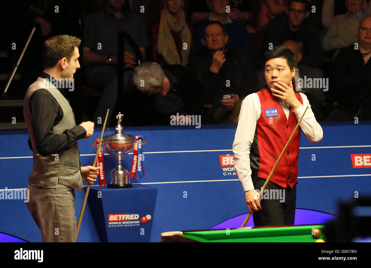 Sheffield. 2nd May, 2016. Ding Junhui (R) of China competes during the ...