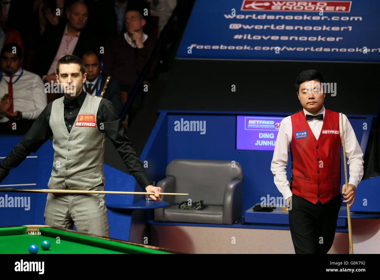 Sheffield. 2nd May, 2016. Ding Junhui (R) of China competes during the ...