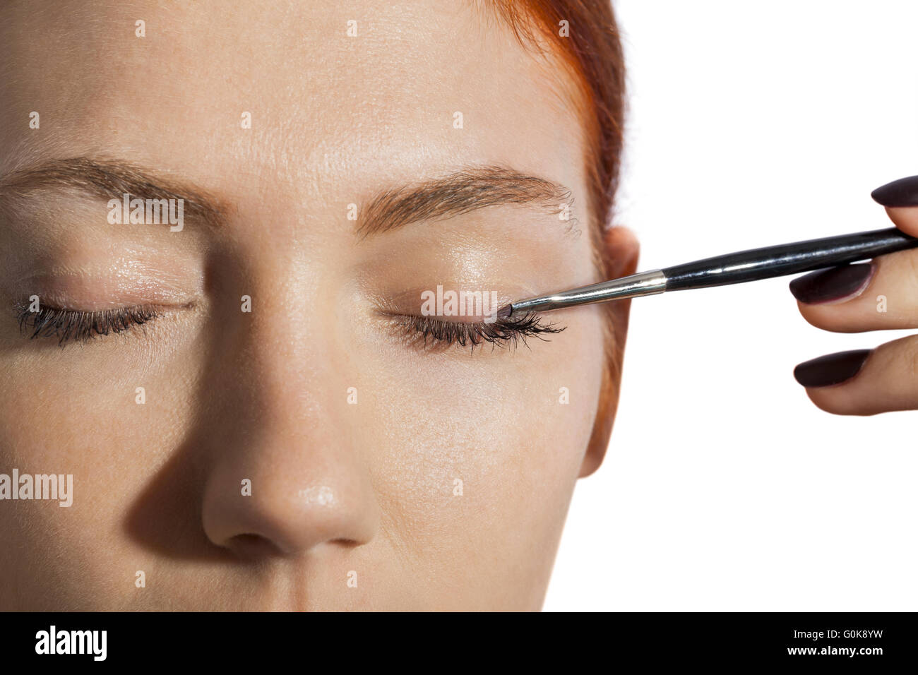 Pretty Woman Applying Eye Shadow Makeup Stock Photo - Alamy