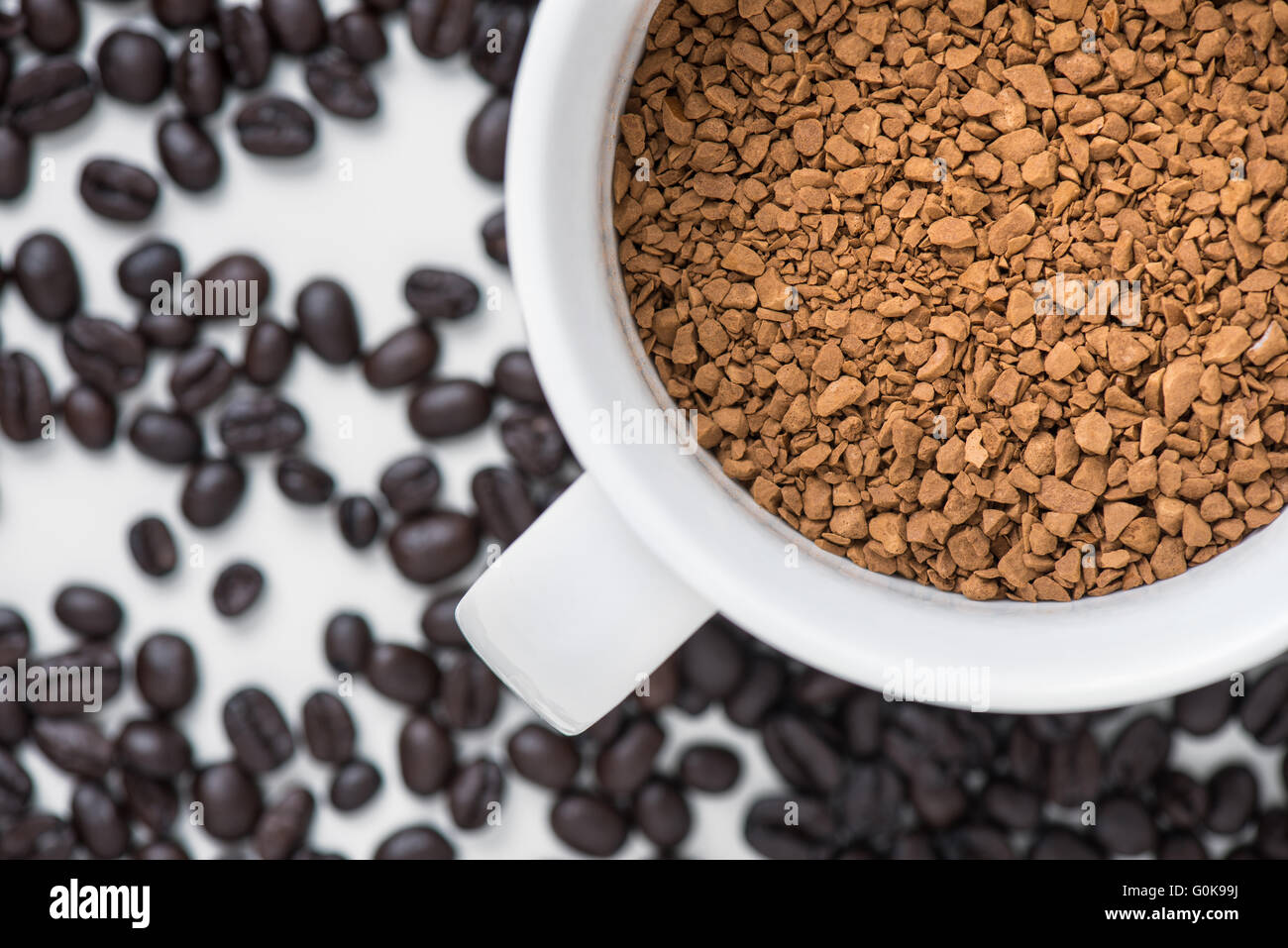 instant coffee in cup with coffe bean Stock Photo - Alamy