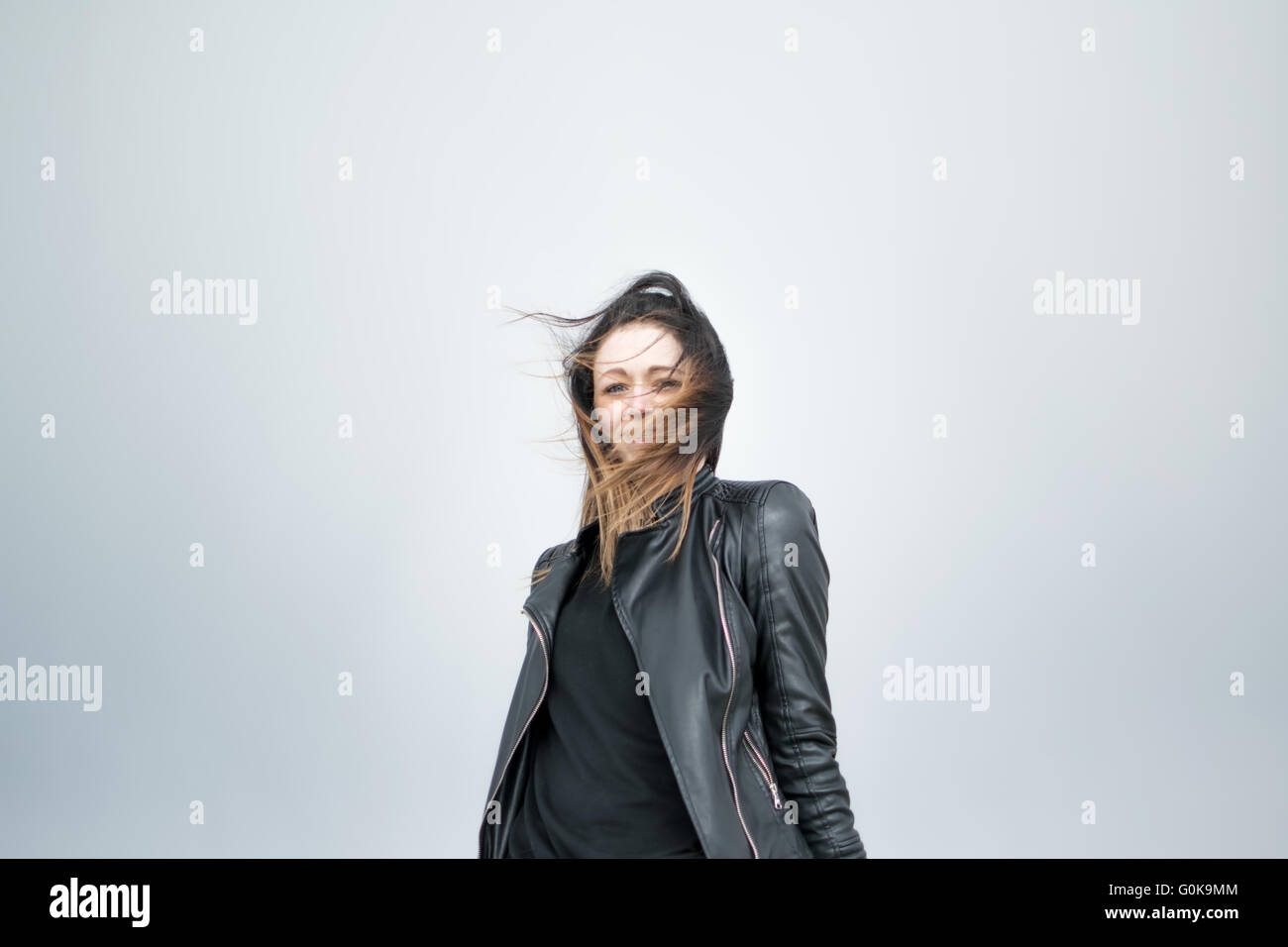Beautiful girl in a plain background Stock Photo - Alamy