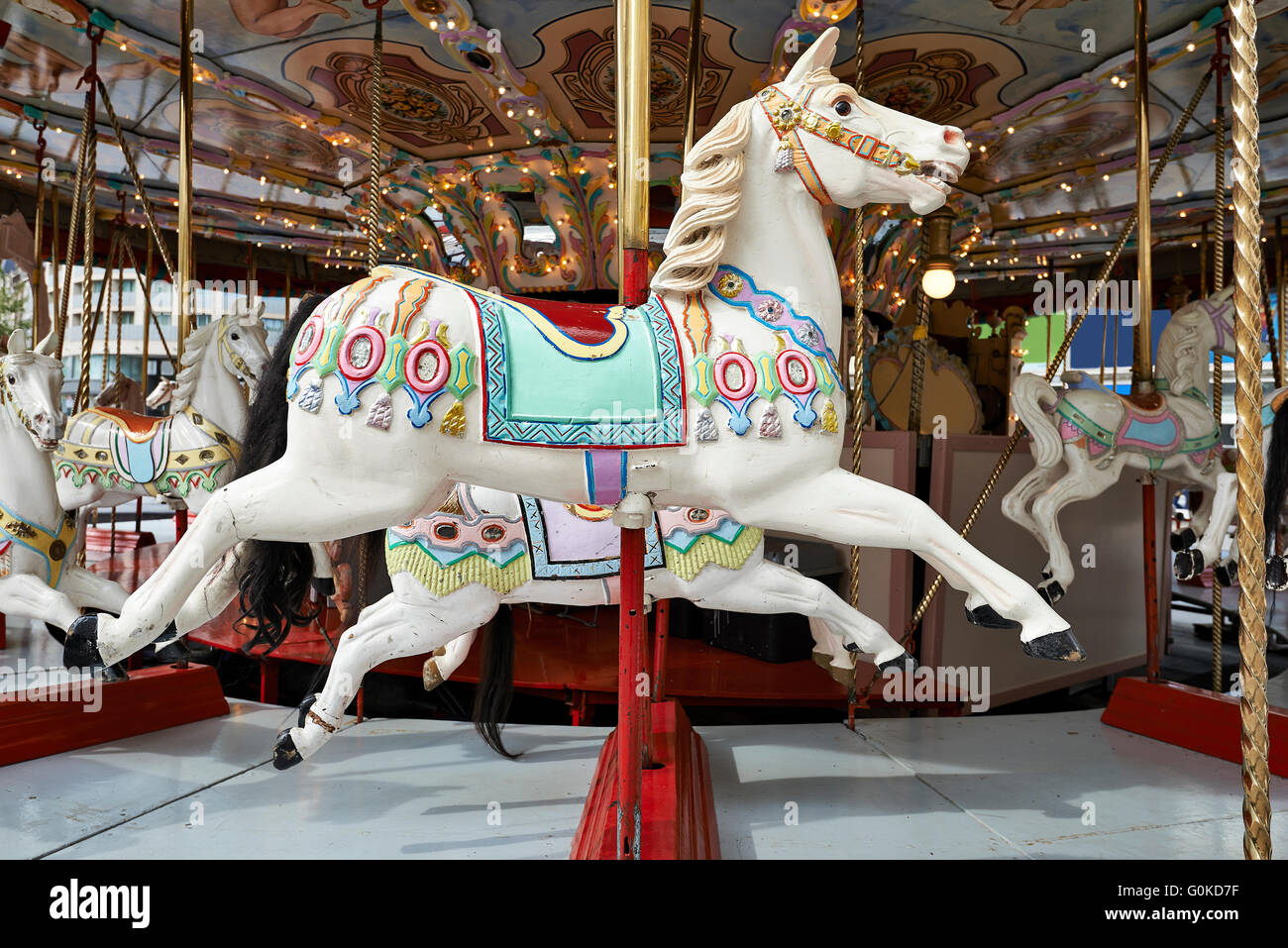 A classic carousel horse. View from side Stock Photo - Alamy