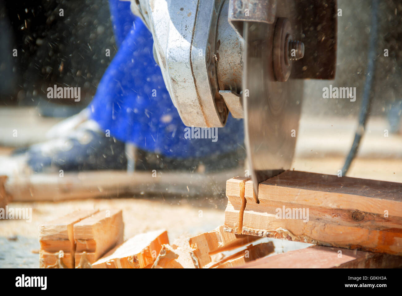 Side view male worker cutting hi-res stock photography and images - Alamy