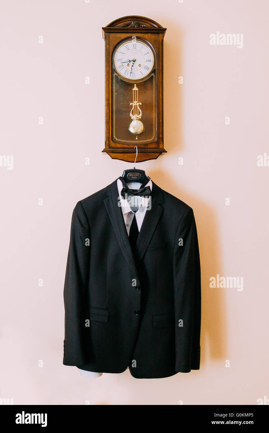 Hanging groom suit hi-res stock photography and images - Alamy