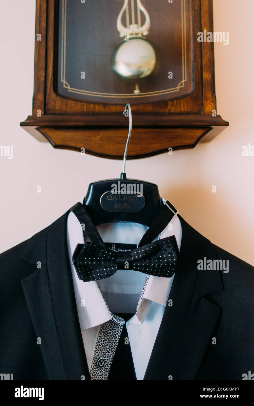 Hanging groom suit hi-res stock photography and images - Alamy