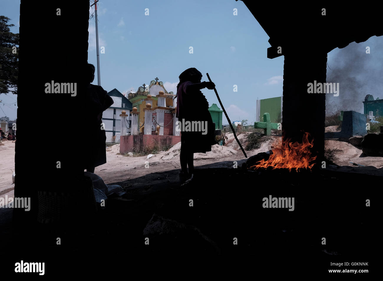 Local woman performs a traditional K'iche Maya ceremony using censers ...
