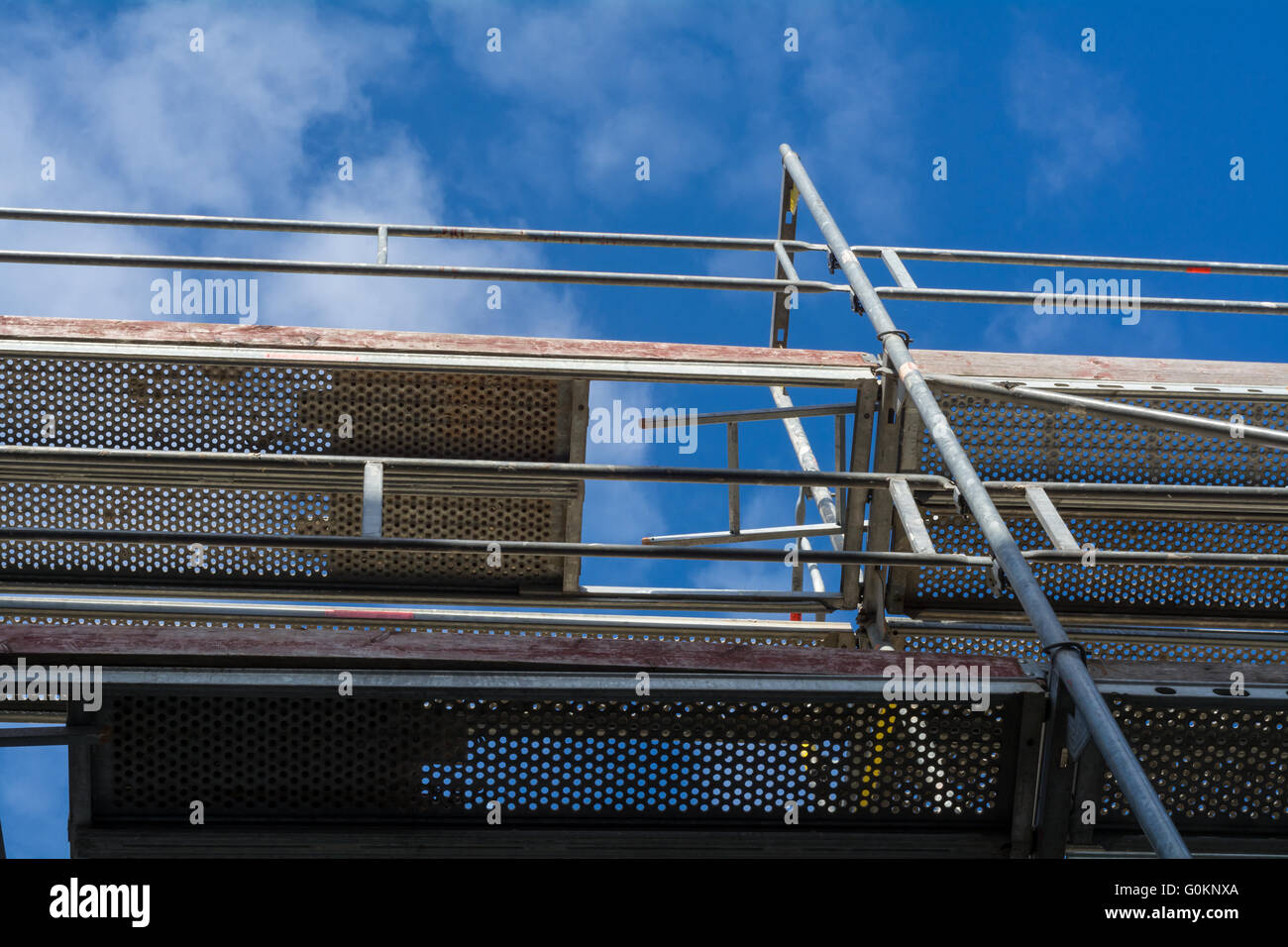 Scaffolding with a view in the blue sky Stock Photo - Alamy