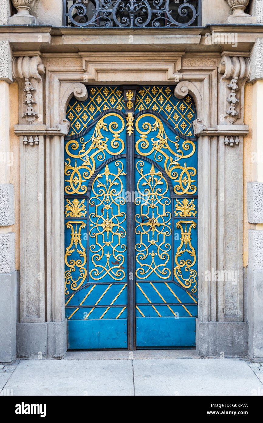 Old decorative blue doors with golden finished decorations Stock Photo ...