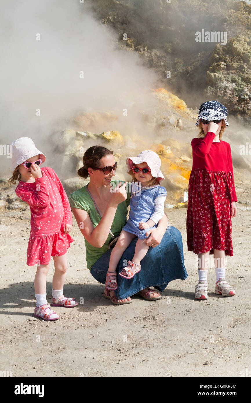 Tourist woman children family at Solfatara volcano steam & sulfurous ...