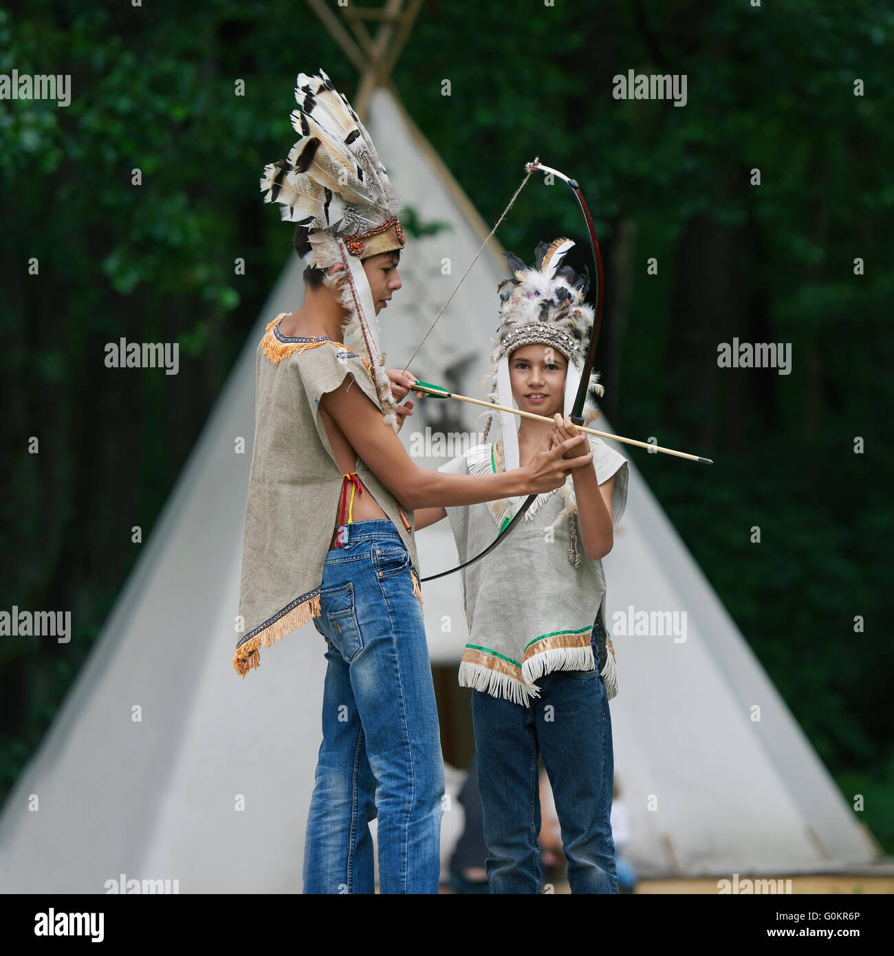 happy children playing native american Stock Photo - Alamy