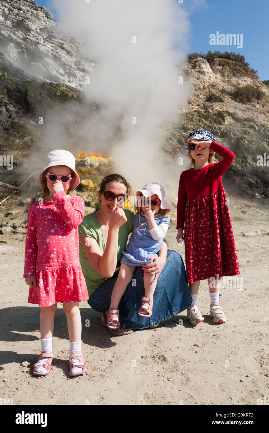 Tourist woman children family at Solfatara volcano steam & sulfurous ...