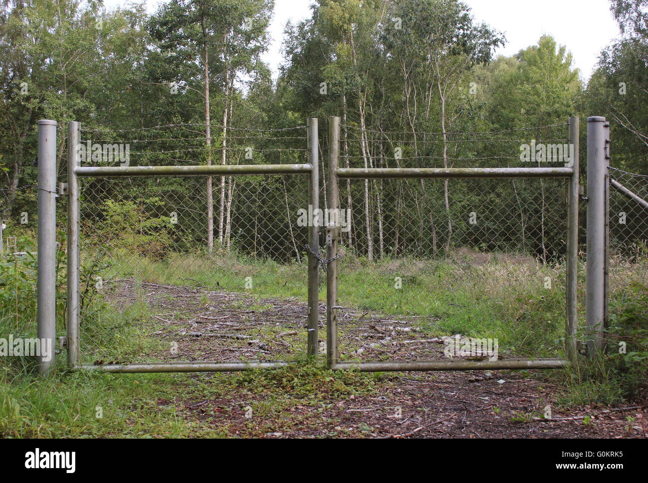 Old door with barbed wire Stock Photo - Alamy