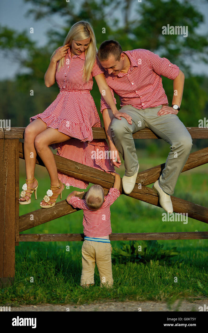 cute little boy with his parents outdoors Stock Photo - Alamy
